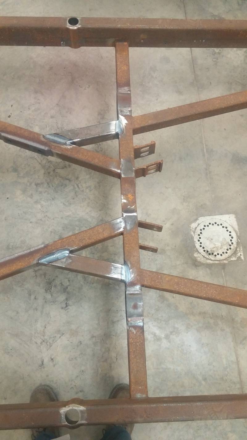 Routing exhaust through frame cross members?